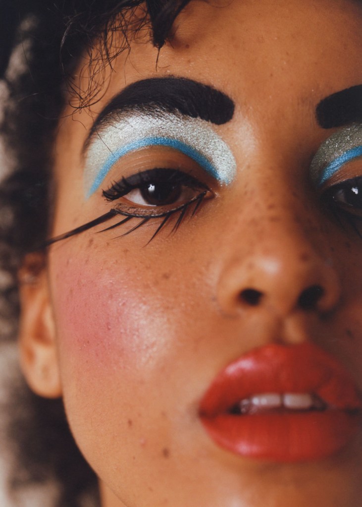 a diverse cast of models capture wild and dramatic beauty looks